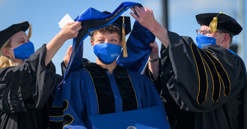 Doctoral hooding | UDaily